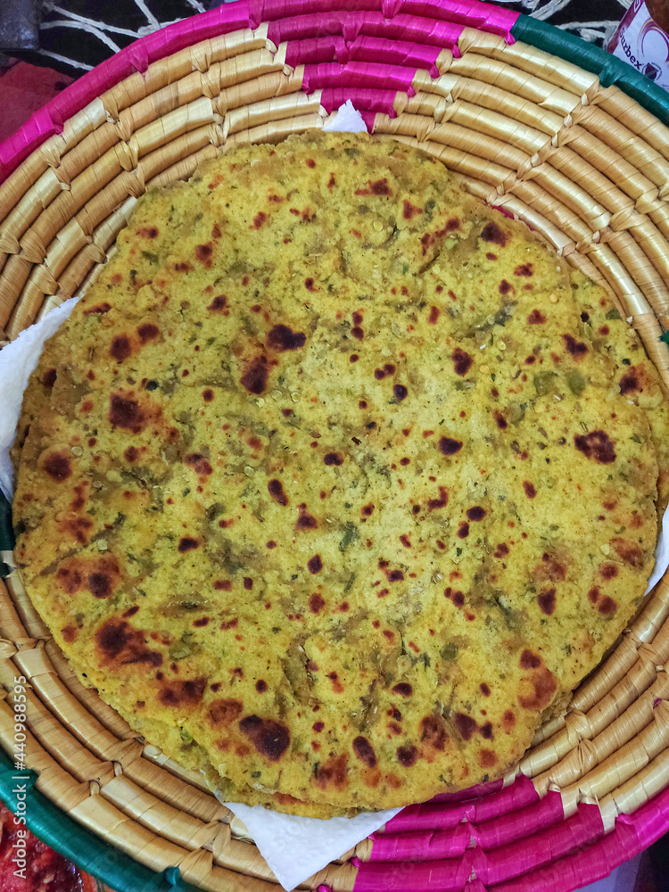 desi spicy food served in traditional crockery in Indian and Pakistani ...