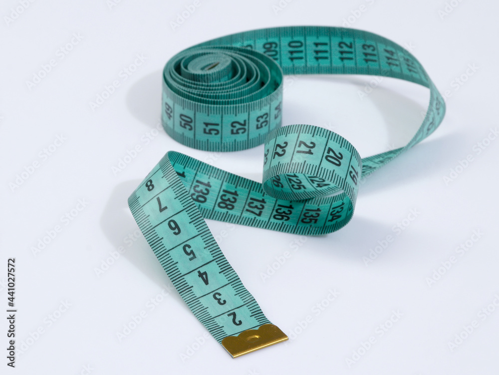 centimeter tape on white background with shadow. Figure measurement ...