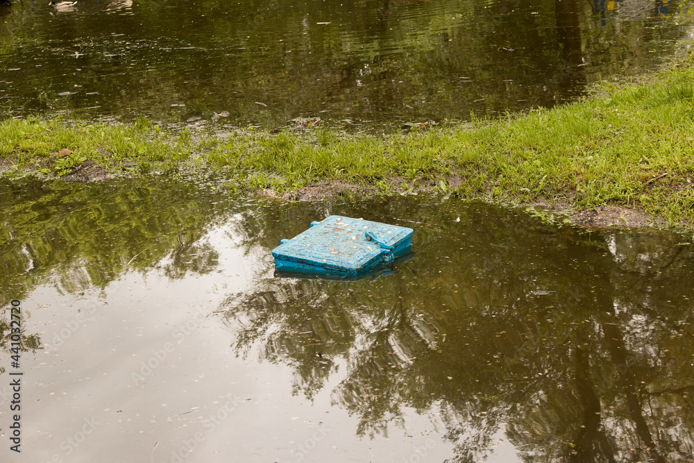 Public park drenched in rain. Water logged park.Wet benches. Park ...