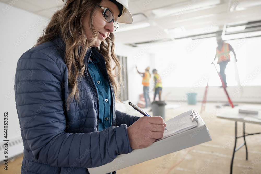Site manager working on site of office renovation Stock Photo | Adobe Stock