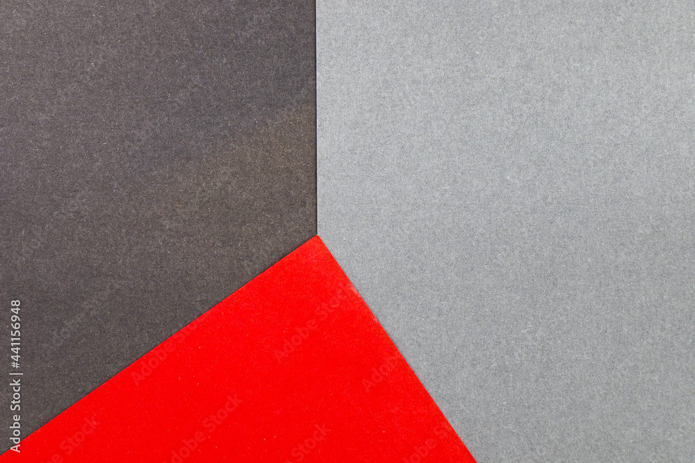 Simple paper background with a vibrant red triangle on a two-colored ...