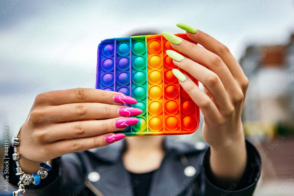 Simple dimple colorful anti stress pop it woman hold hand popping game ...