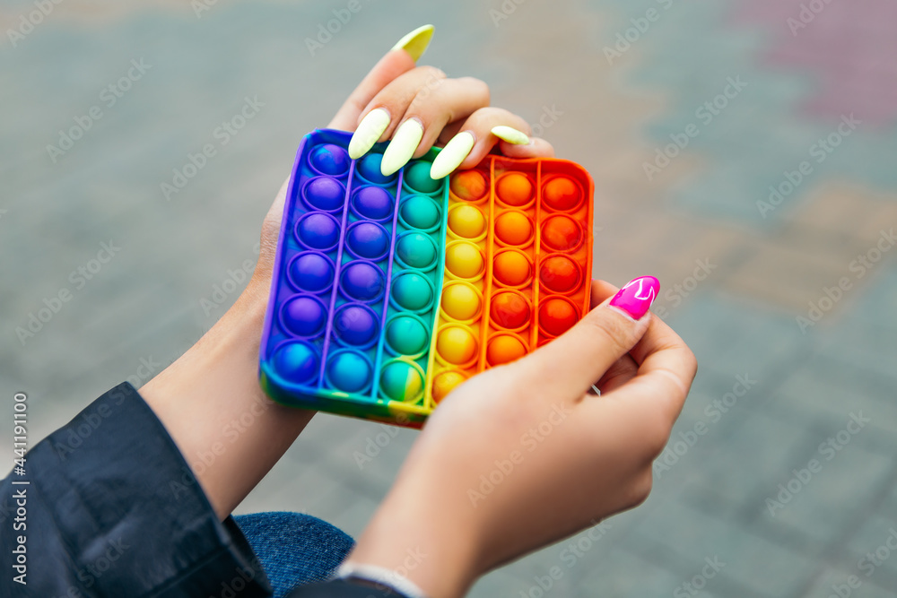 Simple dimple colorful anti stress pop it woman hold hand popping game ...