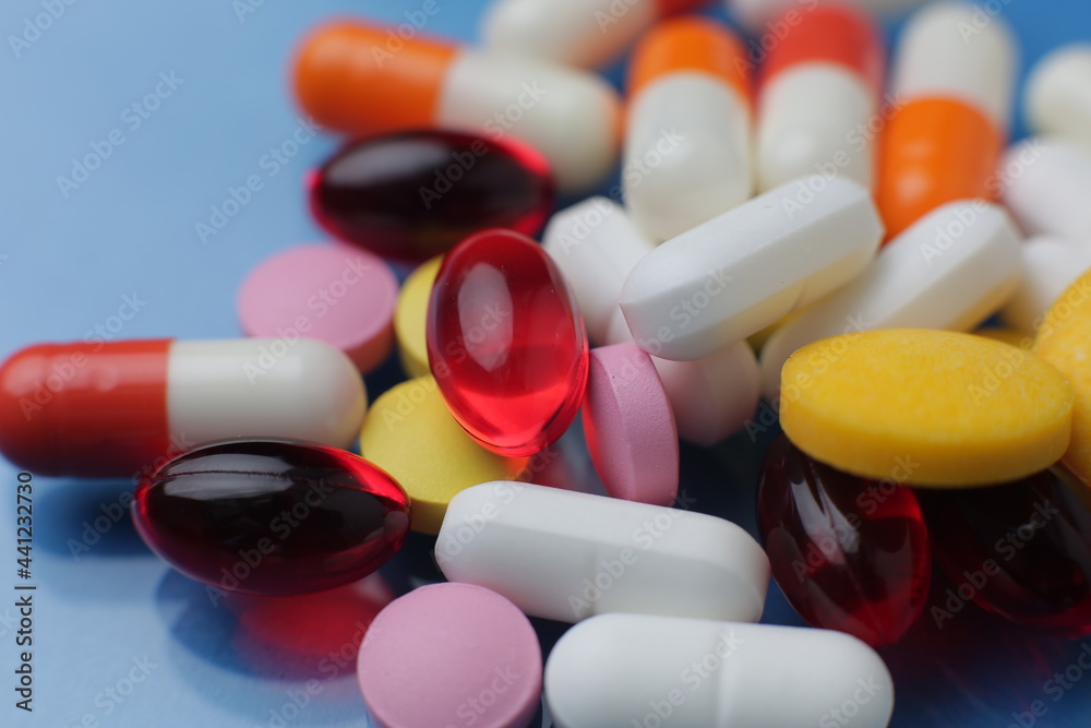 Colorful of tablets and capsules pill in blister packaging arranged ...