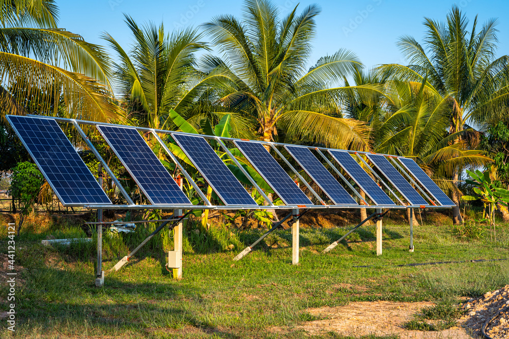 photovoltaic solar power panel for agriculture in a rural houses area ...