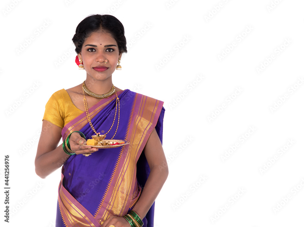 Indian woman performing worship, portrait of a beautiful young lady ...