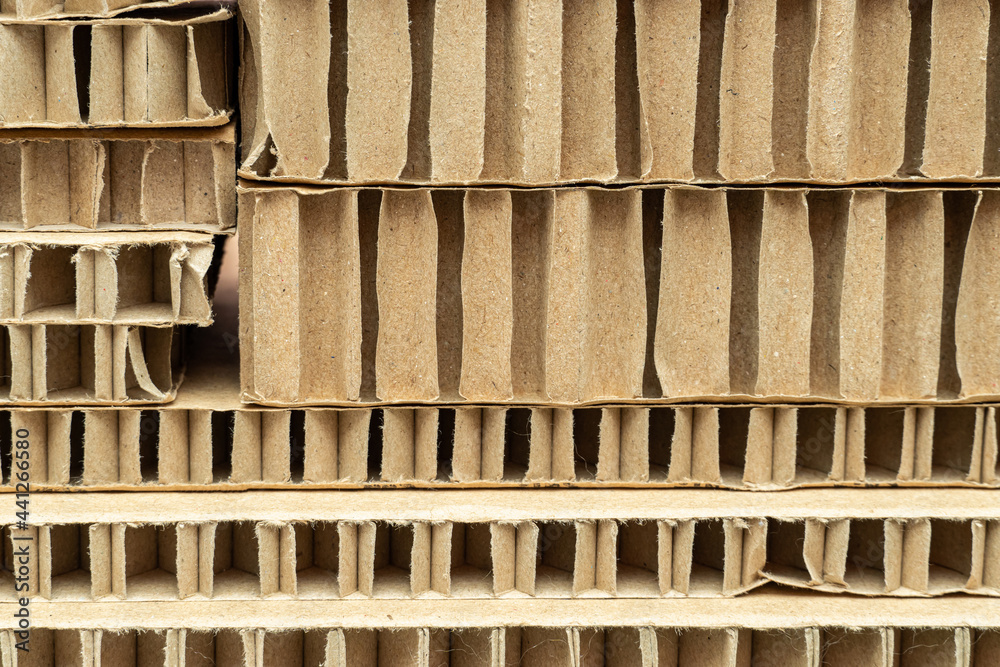 cut of honeycomb cardboard pack stack with large cells close-up as a ...