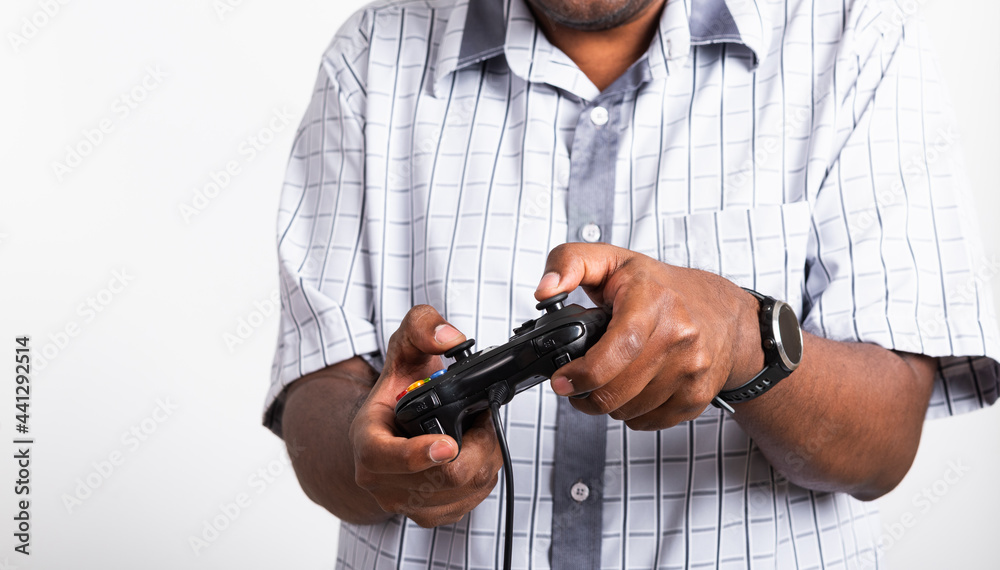 Asian happy portrait young black man funny use hand playing video game ...