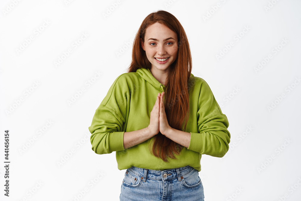 Fotografia do Stock: Please. Smiling cute ginger girl hold hands in ...