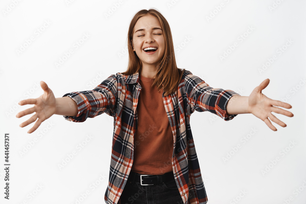 Beautiful girl extending hands, stretching out arms for hugs, embrace ...