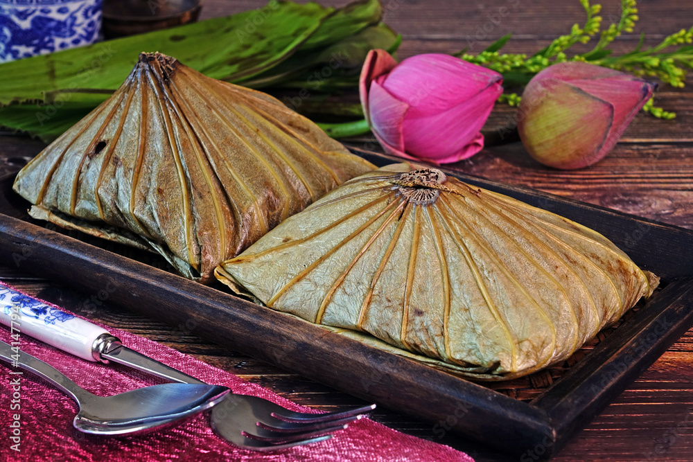 Rice wrapped in Lotus leaf. Famous Chinese cuisine. Vegetarian food ...