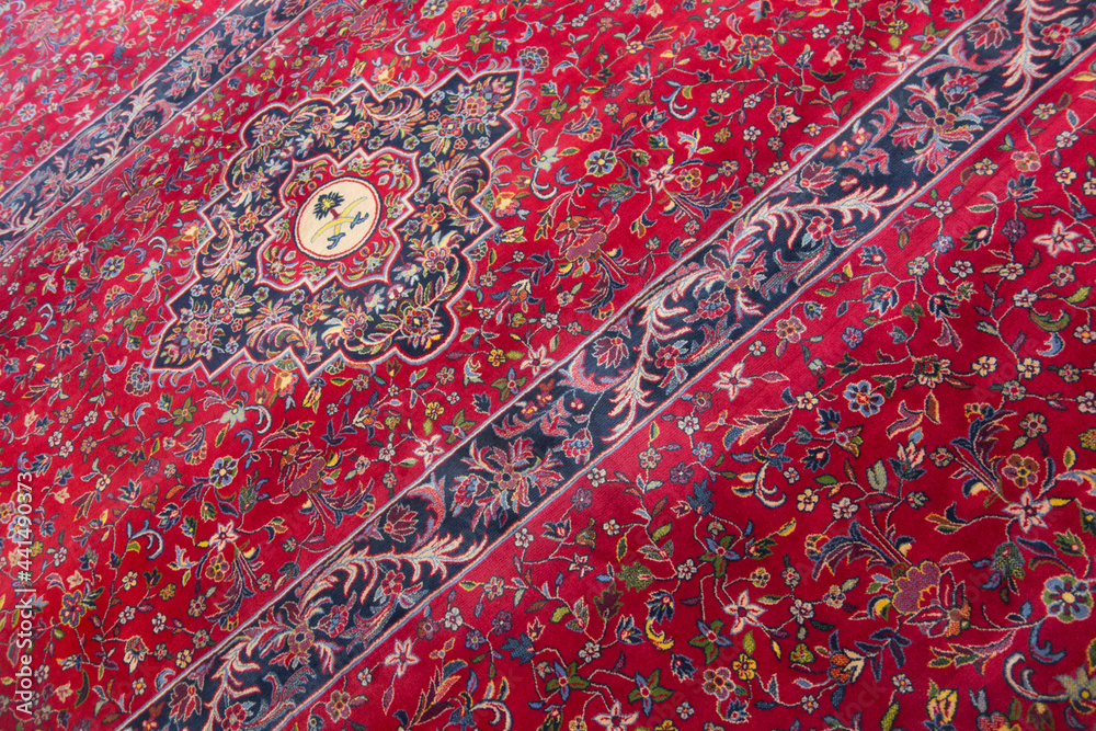 Typical red carpet in a mosque in Saudi Arabia. Stock Photo | Adobe Stock