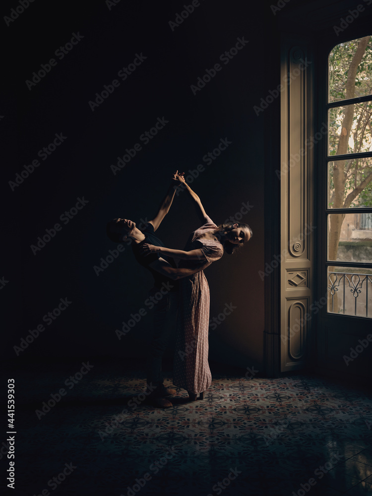 Couple performing ballet positions Stock Photo | Adobe Stock