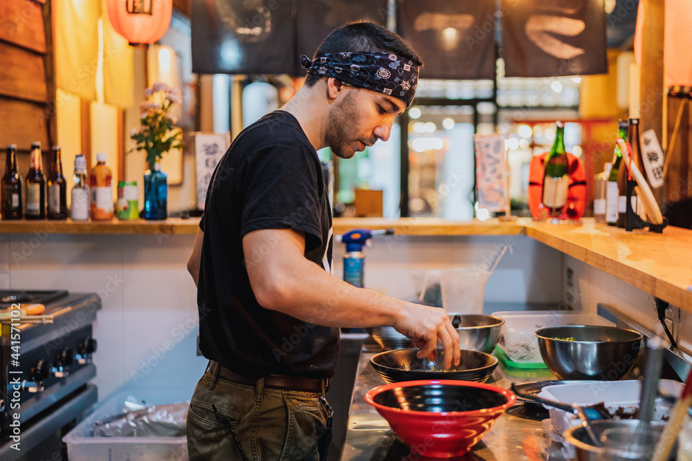 Chef cooking in ramen bar Stock Photo | Adobe Stock