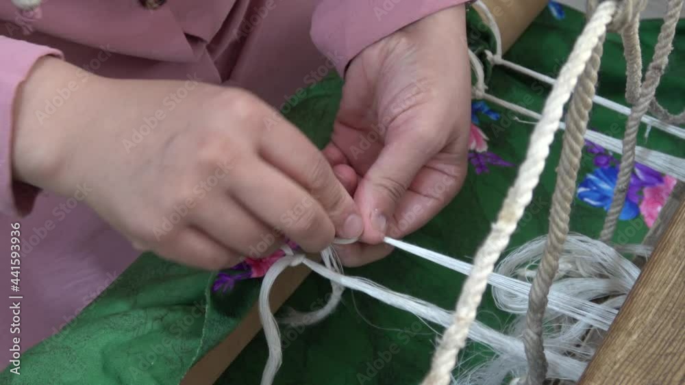 Diyarbakir, Turkey - 16th of June 2021: 4K Hands tie a knot at the silk ...