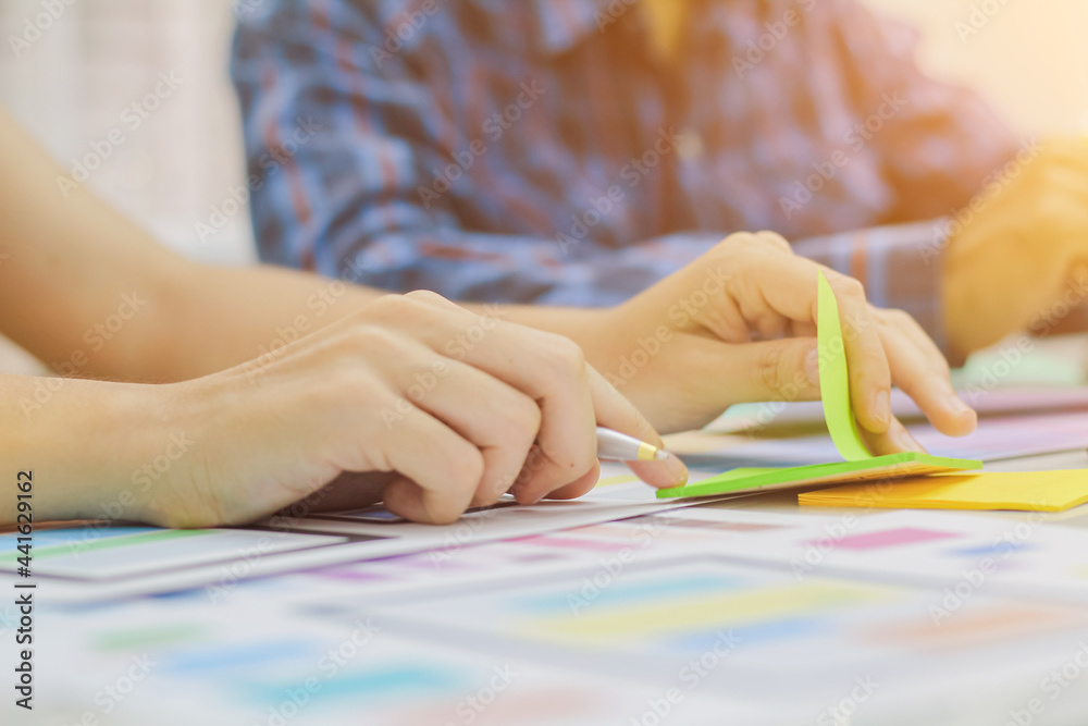 Blurred image,A team of UI UX web designers are working together to ... Blurred image,A team of UI UX web designers are working together to ...