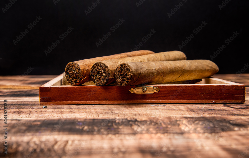 Cuban cigars. Cigar smoking. Cigar tobacco. Cigars in vintage box Stock ...