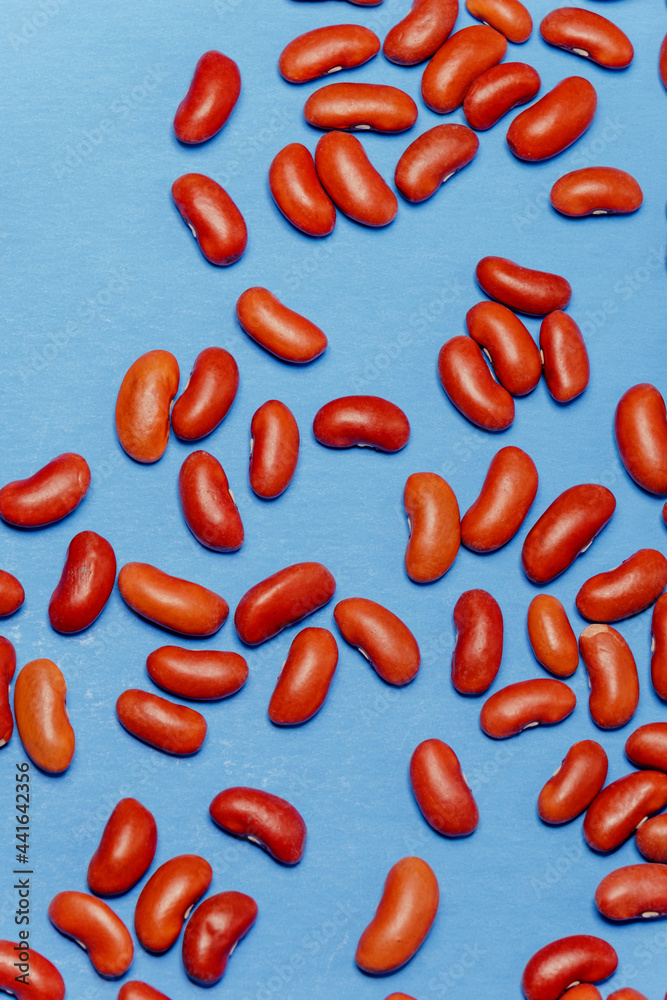 Abstract wallpaper of red beans on blue background Stock Photo | Adobe ...