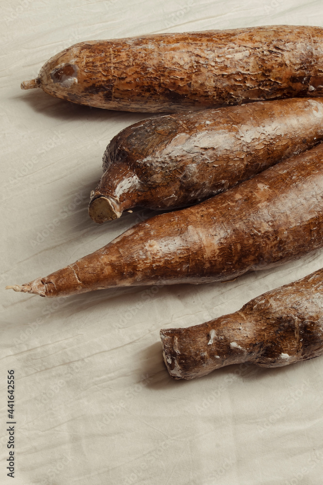 Four yucca root on white background Stock Photo | Adobe Stock