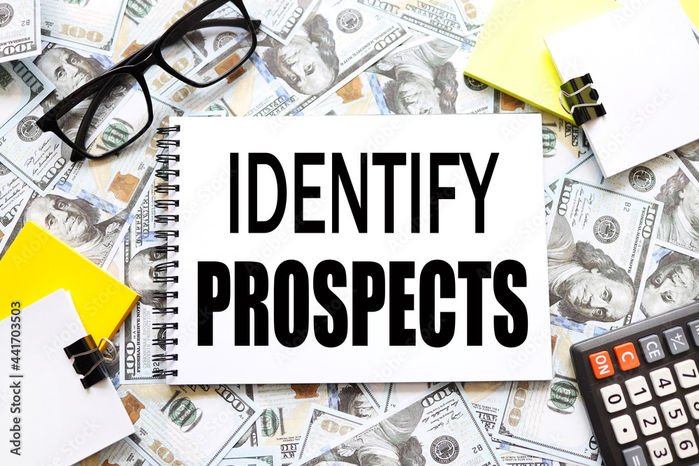identify prospects . background with money, dollar bills. text on an ...