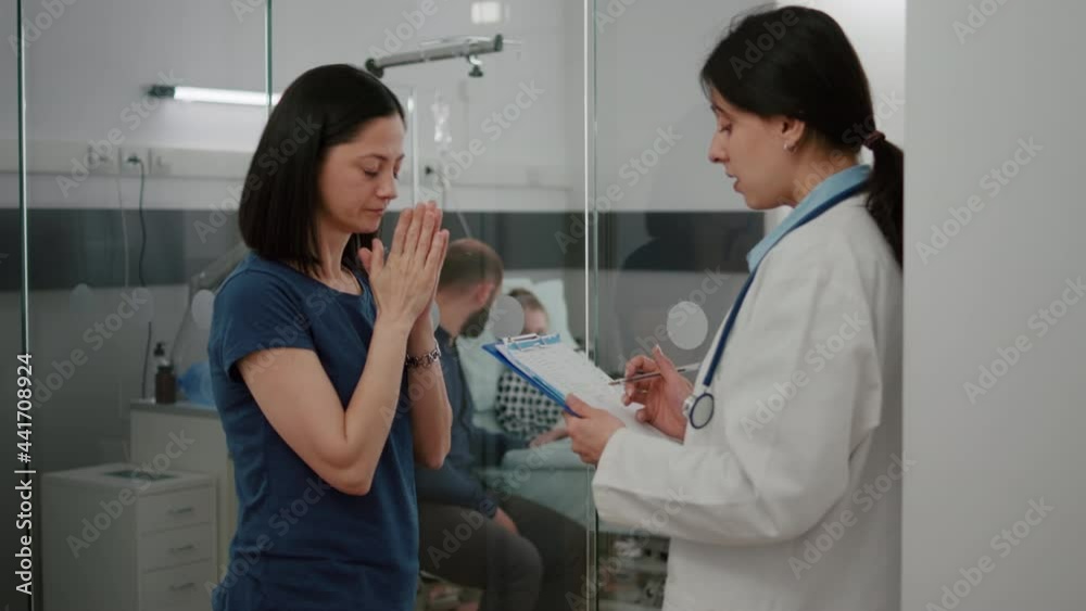 Practitioner doctor explaining sickness diagnosis to panicated worried ...