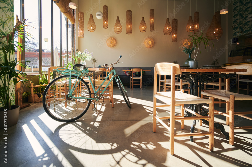 Interior of modern cafe with wooden furniture Stock Photo | Adobe Stock