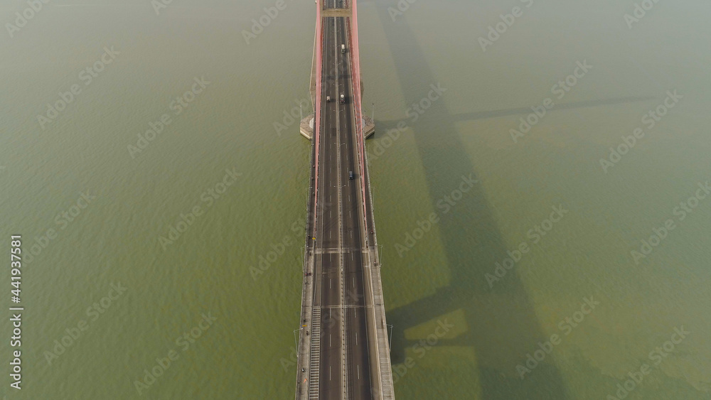 aerial view suspension cable bridge Suramadu over madura strait ...
