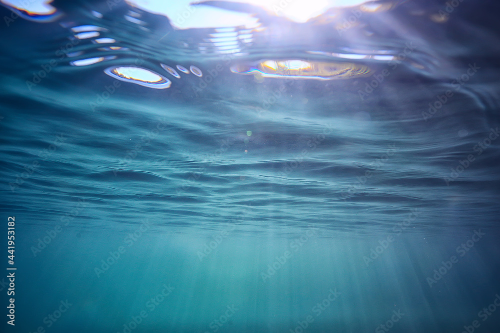 ocean water blue background underwater rays sun / abstract blue ...