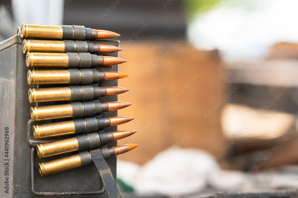 Row of heavy machine gun bullets which is packed in the ammunition ...