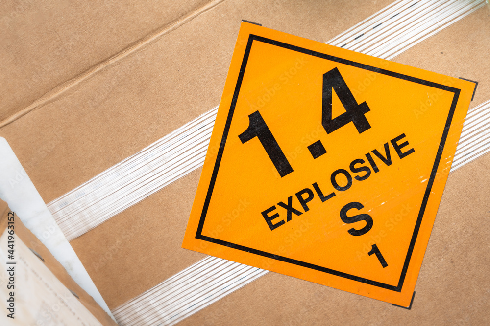 Explosive triangle placard sign on the carton box, to demonstrate the ...