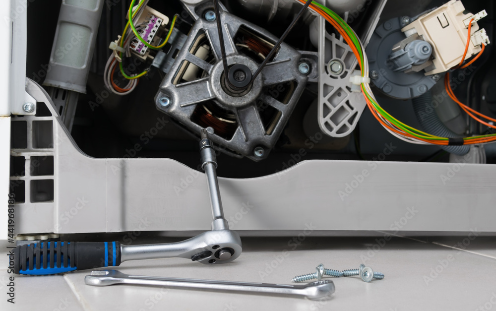 close-up of the internal structure of the washing machine, engine and ...