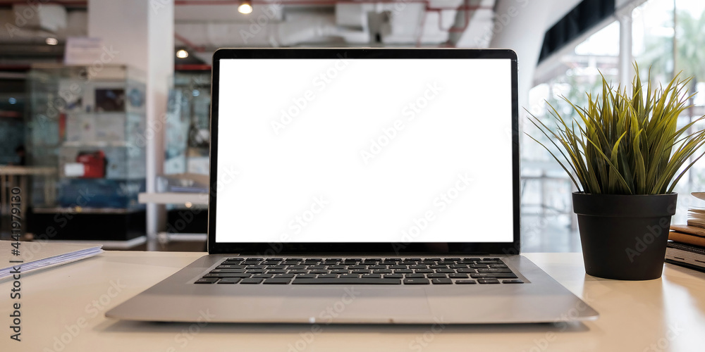 Blank screen Laptop computer and poster workspace background in modern ...