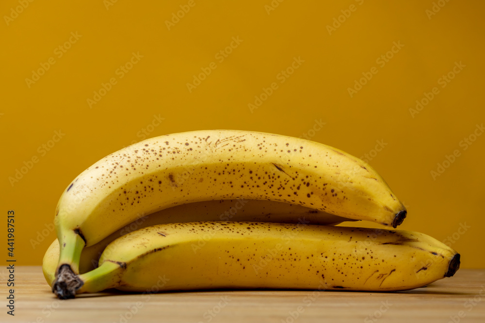 Texture and detail still life of overripe bananas with black spots and ...