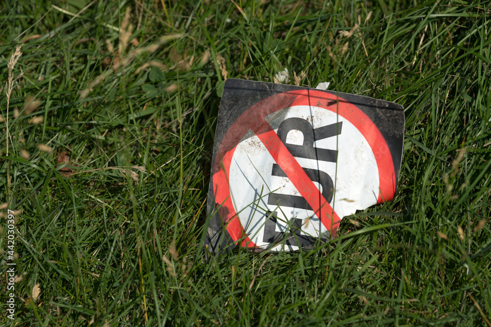 discarded sticker or sign with a circle and diagonal cross and the ...