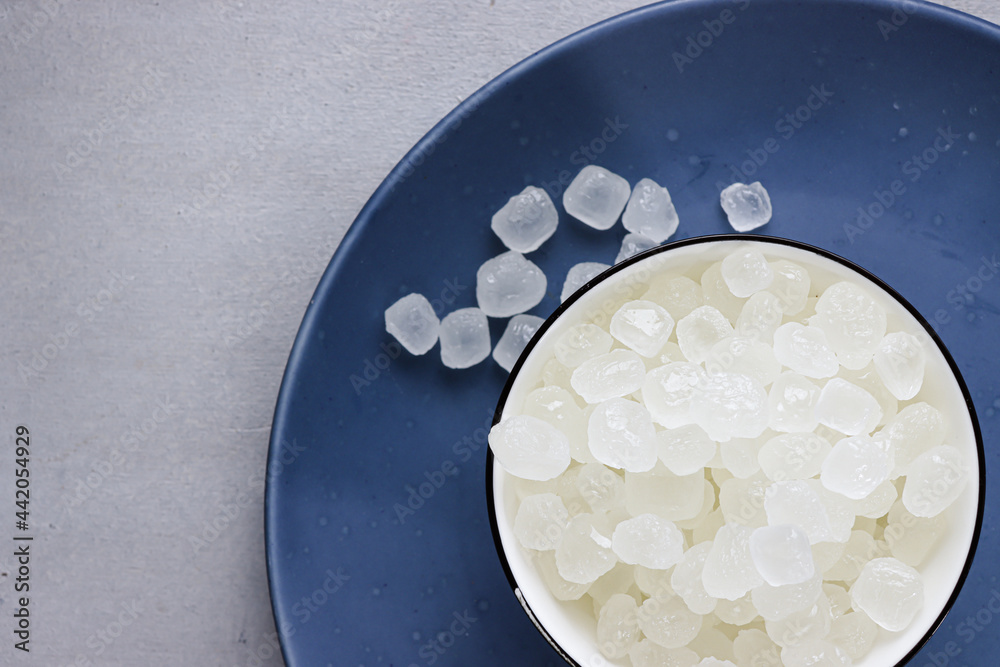 Rock sugar from sugar cane or chinese lump sugar. Stock Photo | Adobe Stock