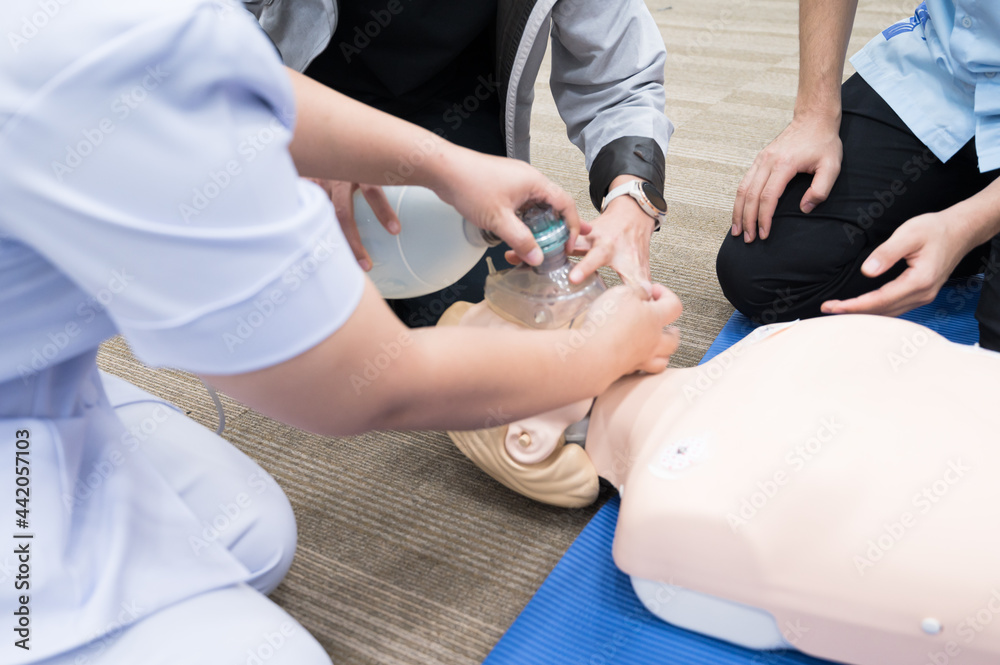 Demonstrating CPR (Cardiopulmonary resuscitation) training medical ...