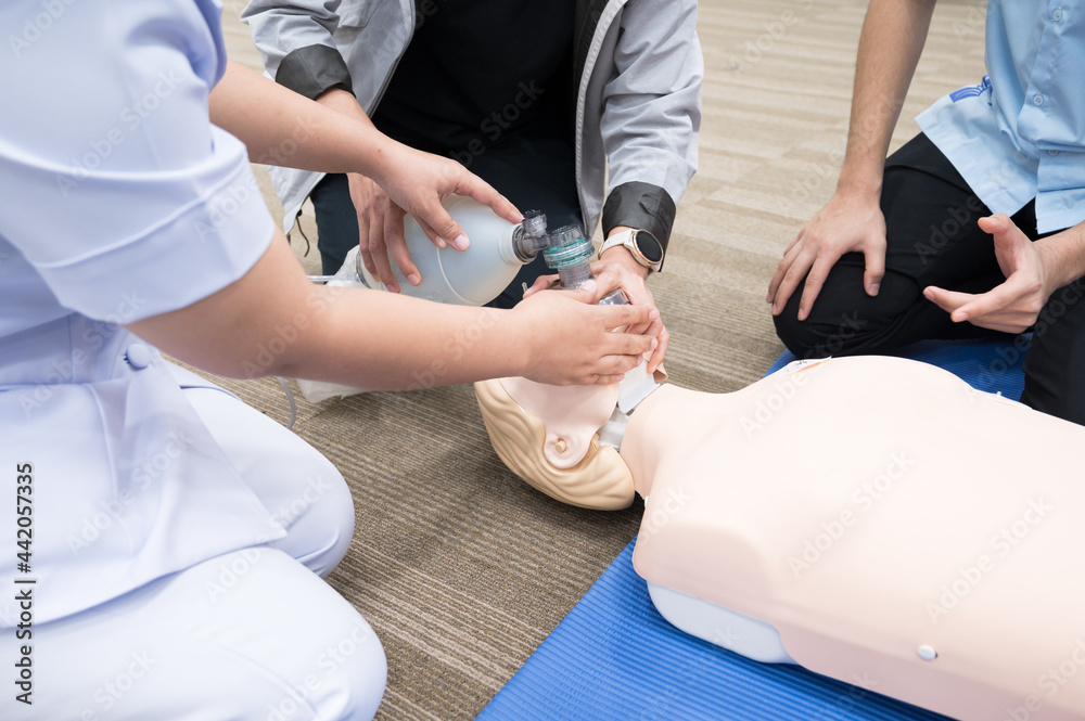 Demonstrating CPR (Cardiopulmonary resuscitation) training medical ...
