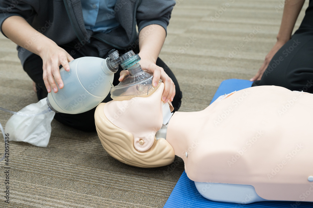 Demonstrating CPR (Cardiopulmonary resuscitation) training medical ...