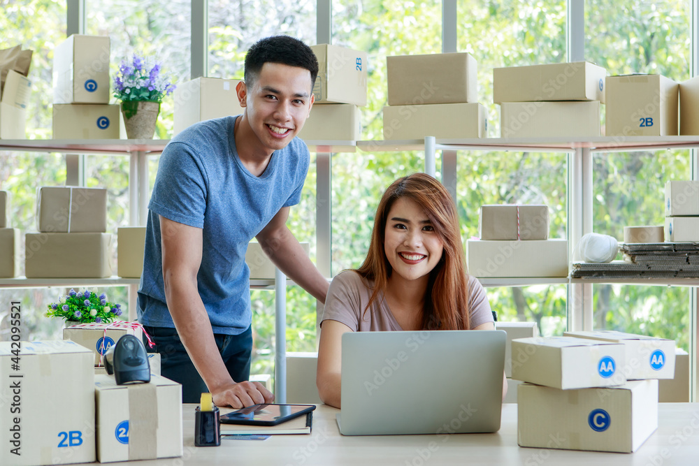 Stockfoto man and woman as colleague of delivery service business ...