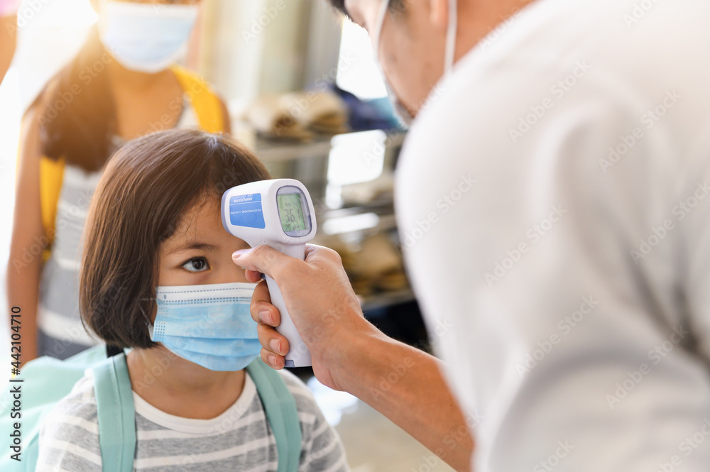 Temperature screening and medical checking the student at preschool ...