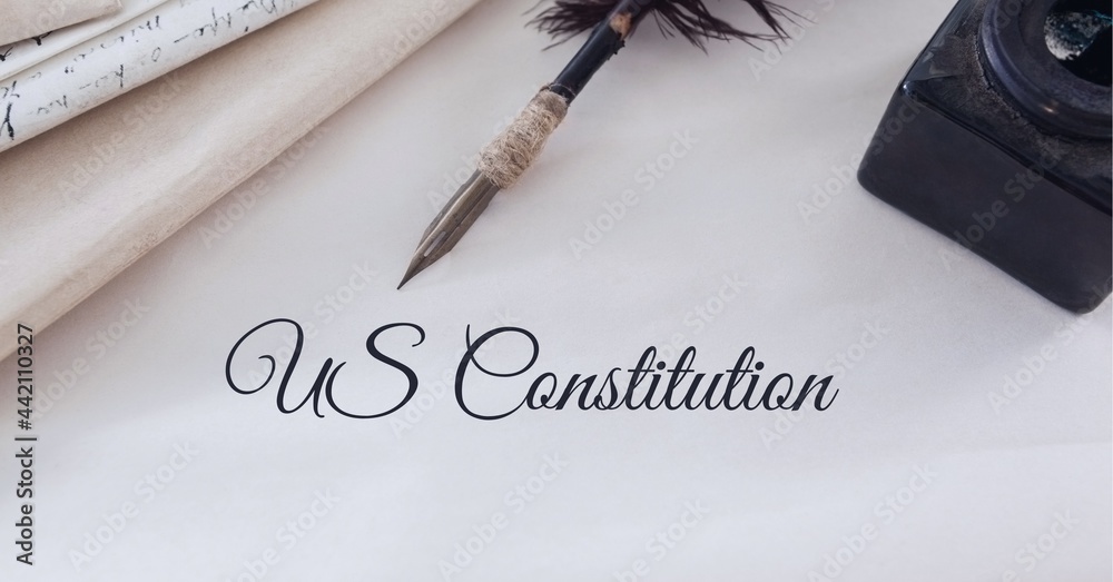 Composition of text us constitution, with quill pen and inkwell on ...