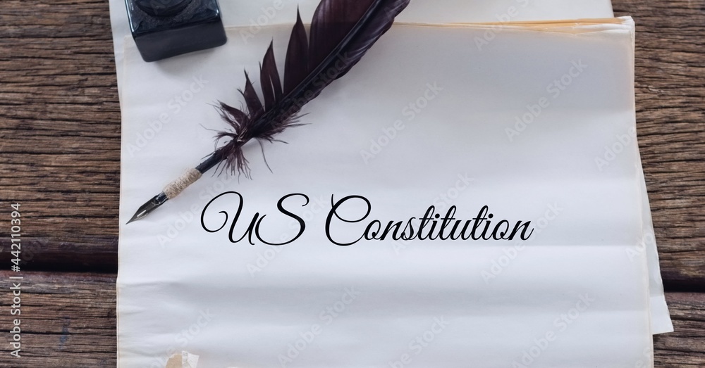 Composition of text us constitution, with quill pen and inkwell on ...