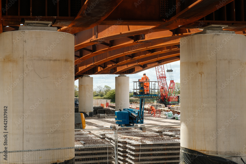 Construction Workers working at height on a new bridge which is part of ...