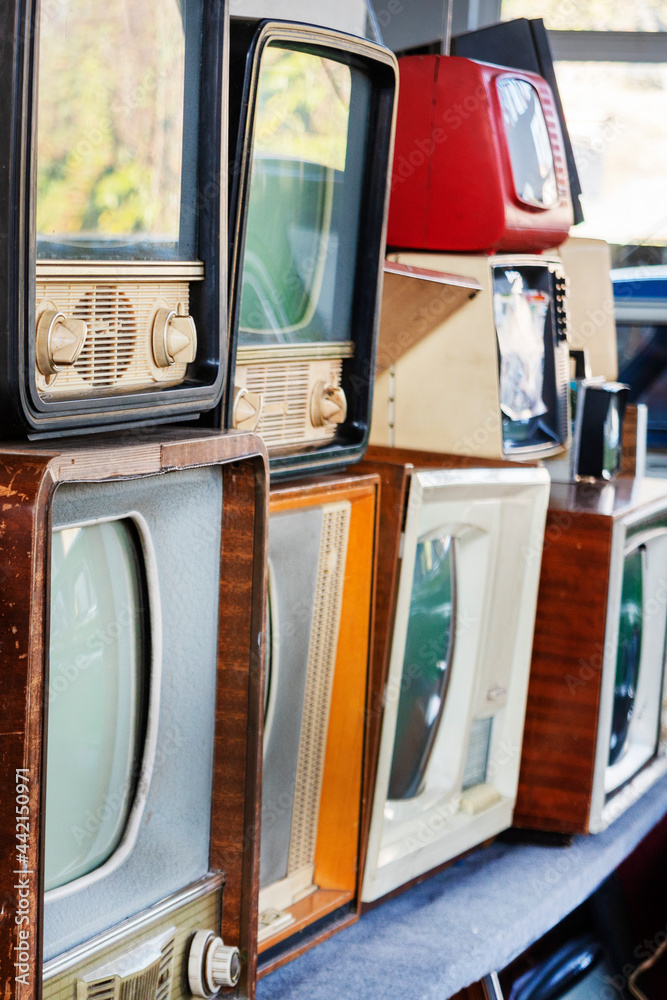 Many retro television. vintage old TV is colorful multi-row. Seeing the ...