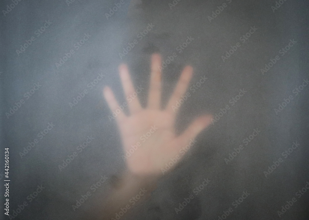 Silhouette hands behind the mirror Abstract style, One hand on a glass ...