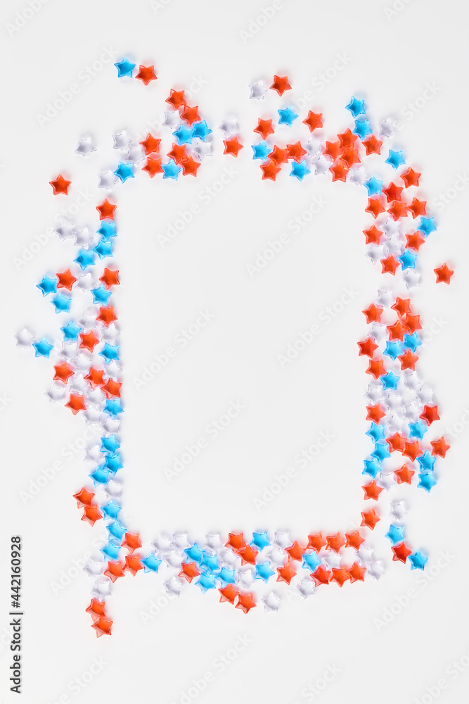 beautiful frame of blue, red and transparent stars on a white ...