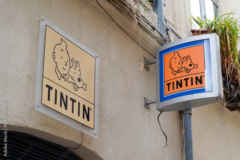 Tintin text brand and logo sign store of comic hero shop sell book ...