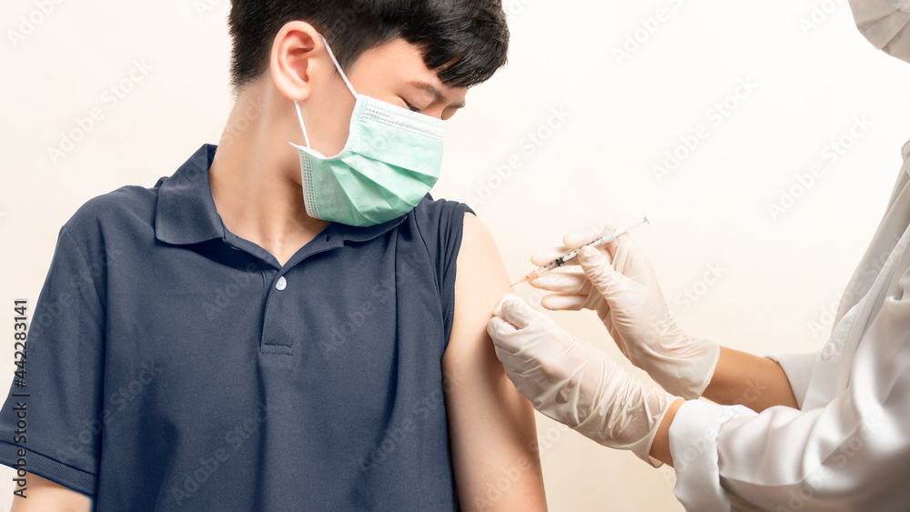 COVID 19 Vaccination for kids and teenager concept. Smart Asian teen ...