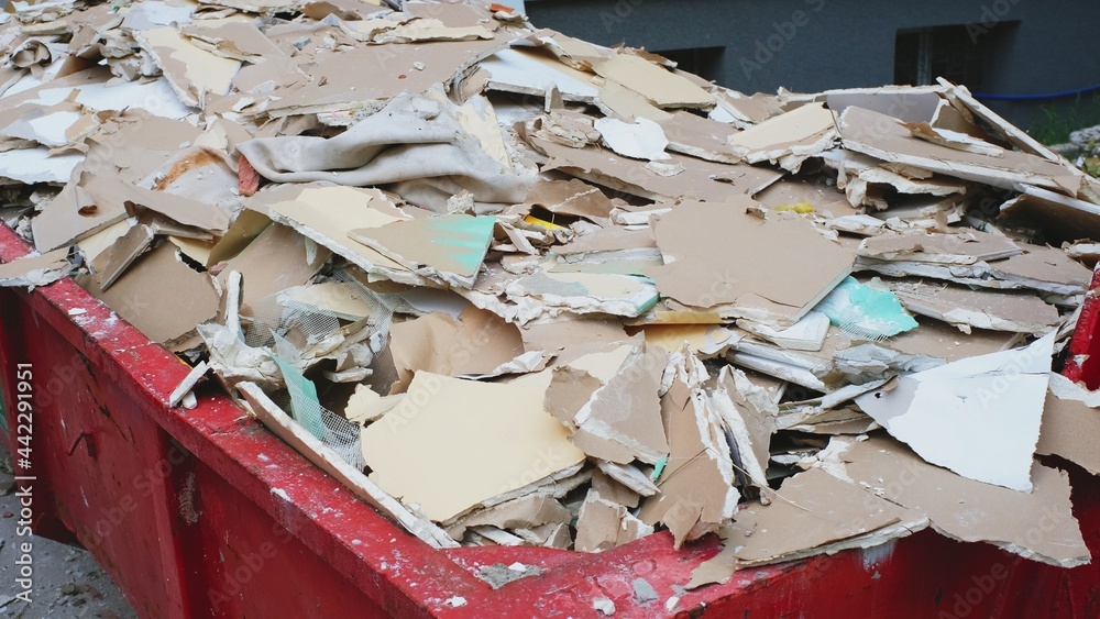 Pile of Hazardous Construction Materials Waste In Large Metal Garbage ...