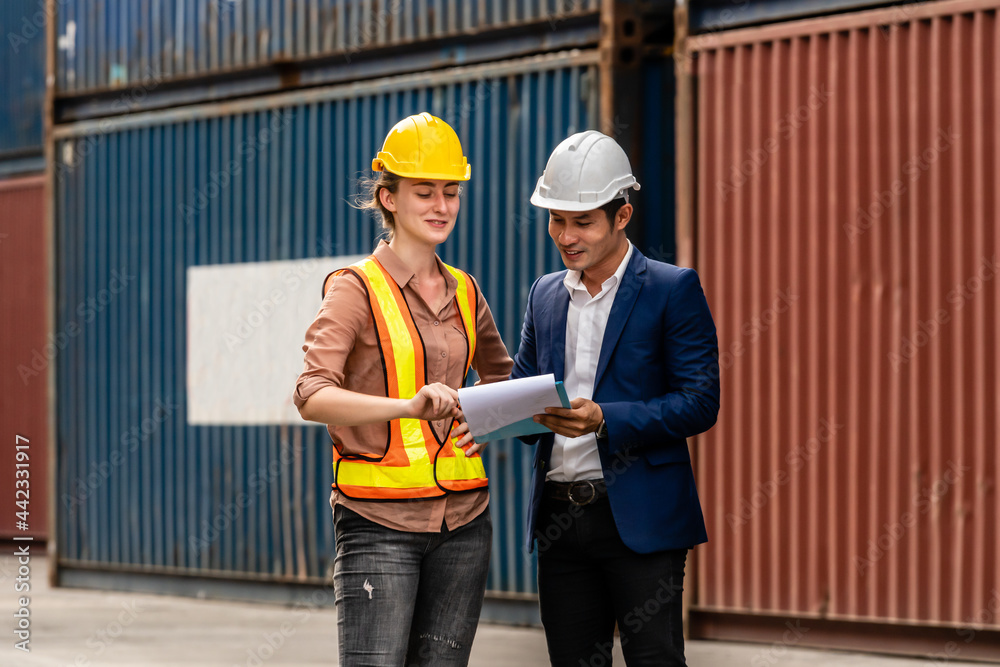 Container Depot chief talking to female foreman about custom goods ...